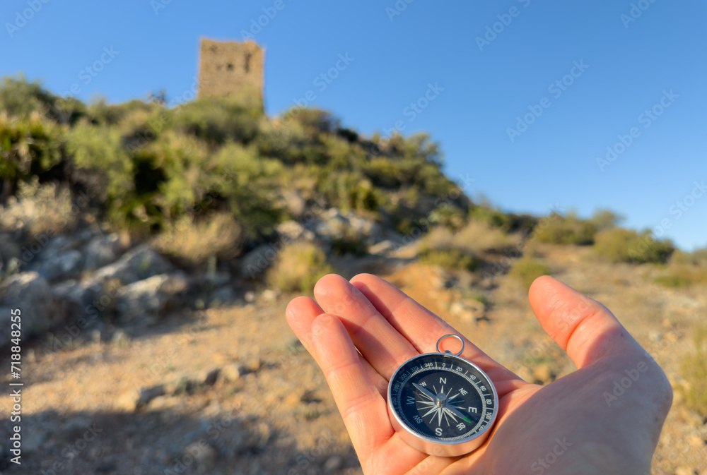 Compass in hand in mountains. Tourist compass for orientation on ...