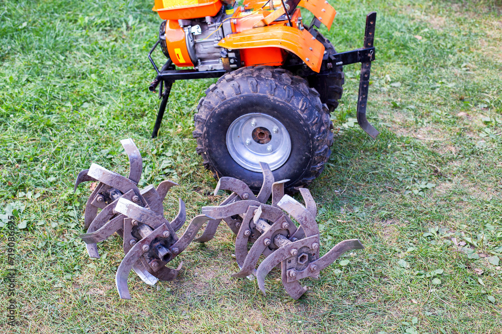 cutters complete with walk-behind tractor for work on the ground ...
