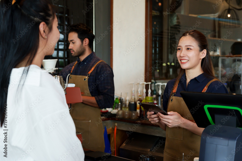 business couple beautiful Asian cafe owner holding tablet taking orders ...