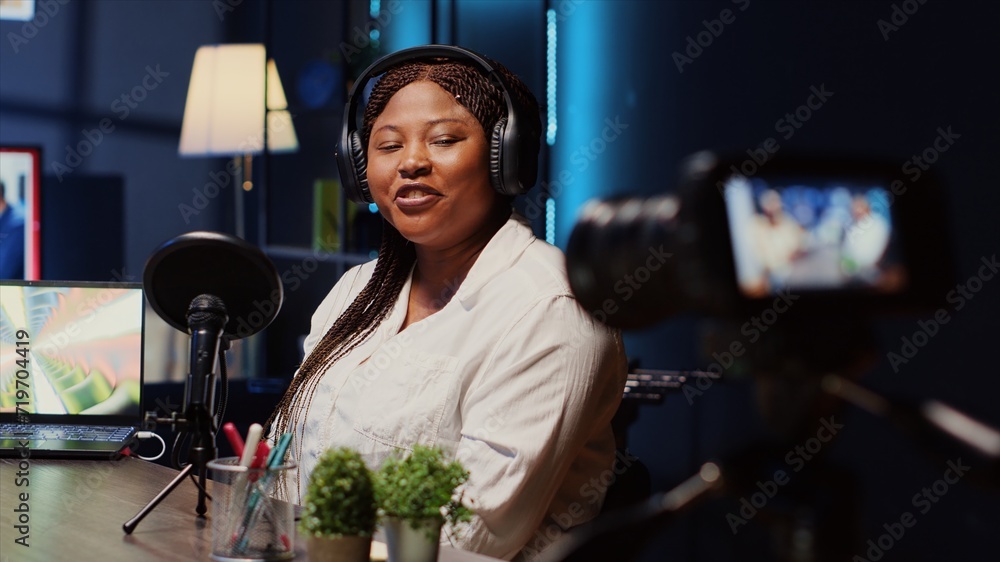 Woman invited on internet podcast looking at camera while telling ...