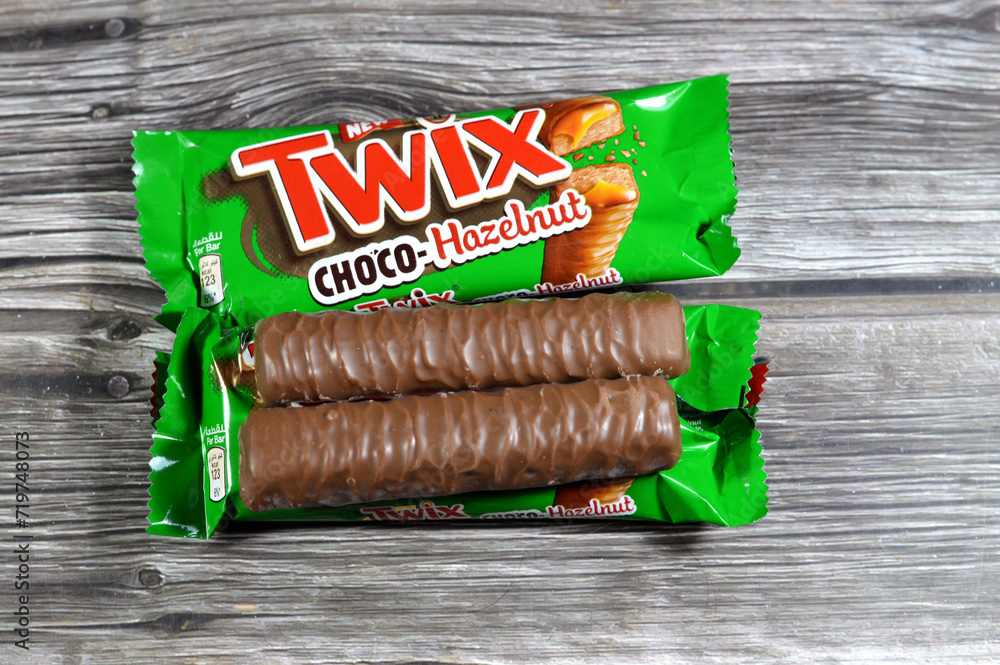 Cairo, Egypt, January 25 2024: Twix new Choco-hazelnut caramel shortbread chocolate bar Mars Inc ...