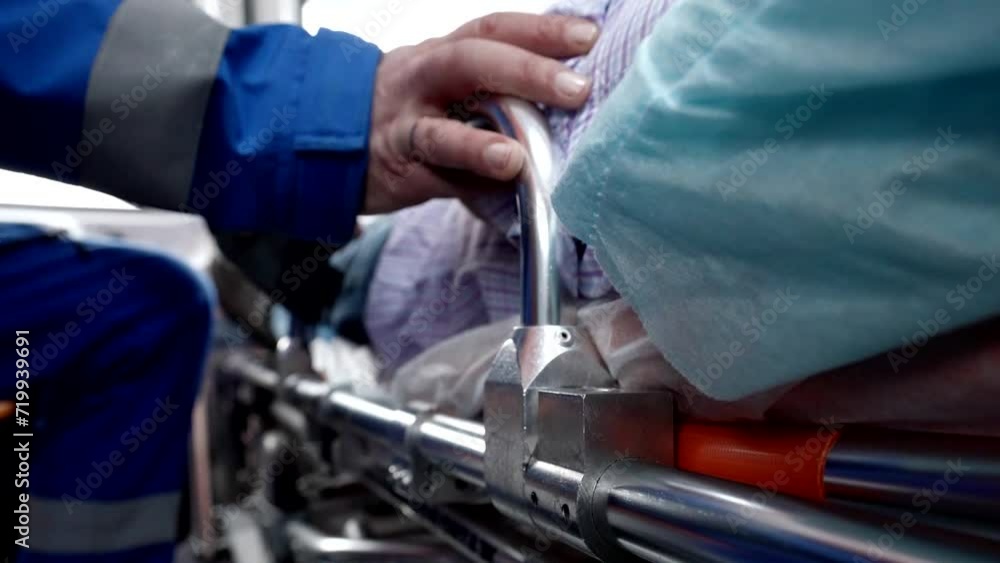 Vidéo Stock health professional man fixing patient inside ambulance car ...