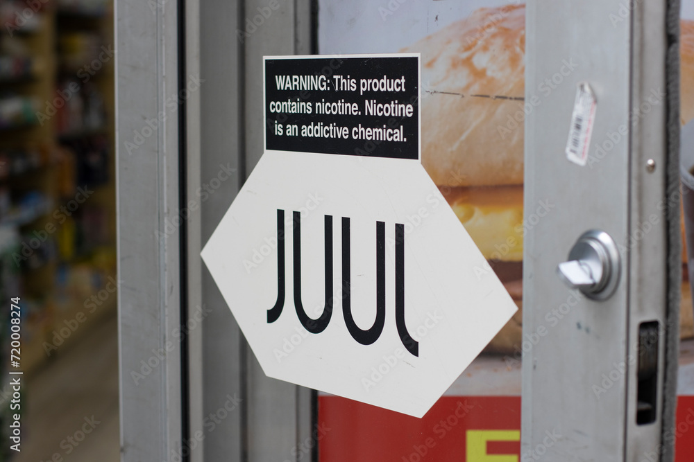 New York, NY, USA - July 8, 2022: Juul signage with nicotine warning ...