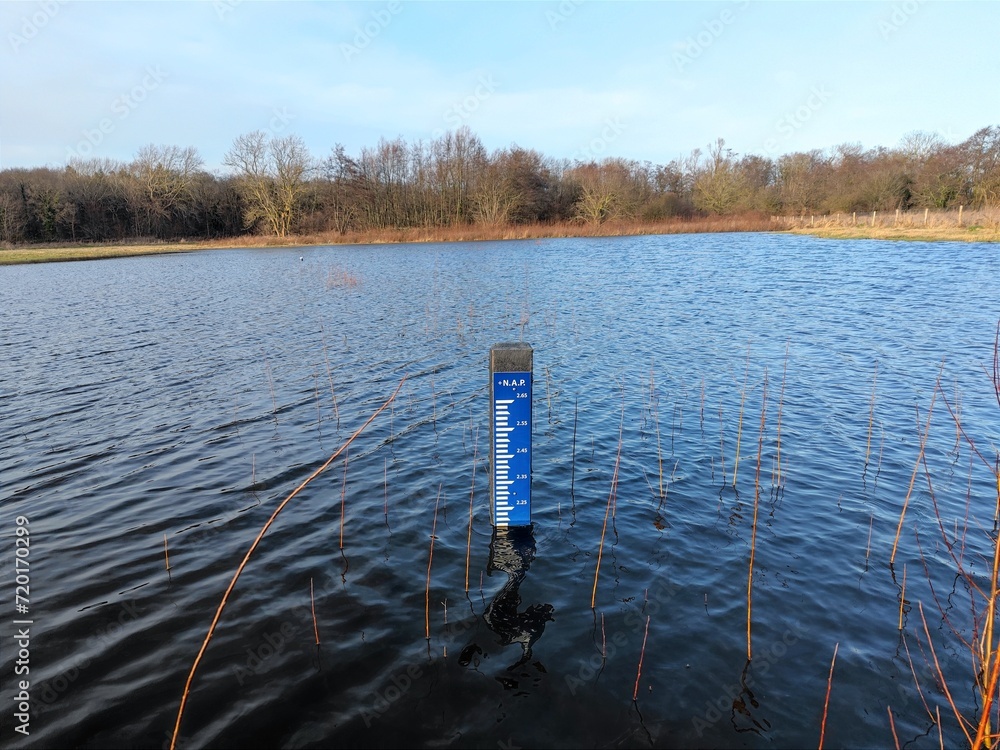 NAP Normaal Amsterdams Peil (Normal Amsterdam Level) board in a lake in ...