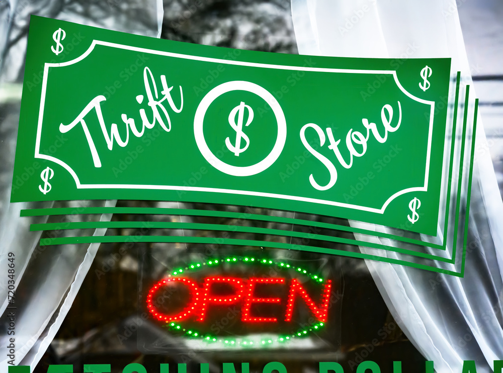 The Red "Open" sign is lit in the window of this little Thrift Shop ...