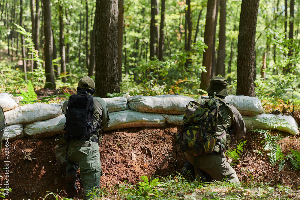 two elite soldiers stand guard, resolute and vigilant, defending the ...