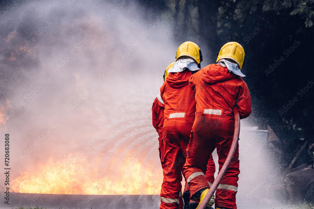 Firefighter Concept. Several firefighters go offensive for a fire ...