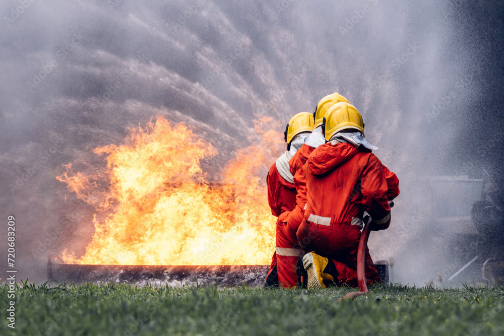 Firefighter Concept. Several firefighters go offensive for a fire ...