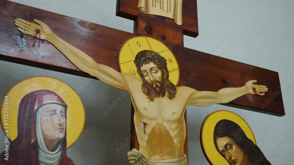 Crucifixion scene with a sculpture of Jesus Christ on the cross ...