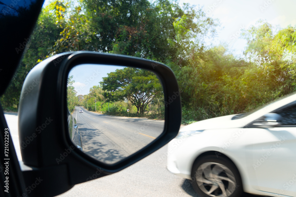 Transportation of car view of mirror wing of car. with other car ...