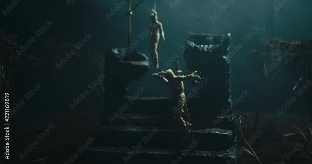 A miniature of a two mummified bodies hanging on the gallows at the ...