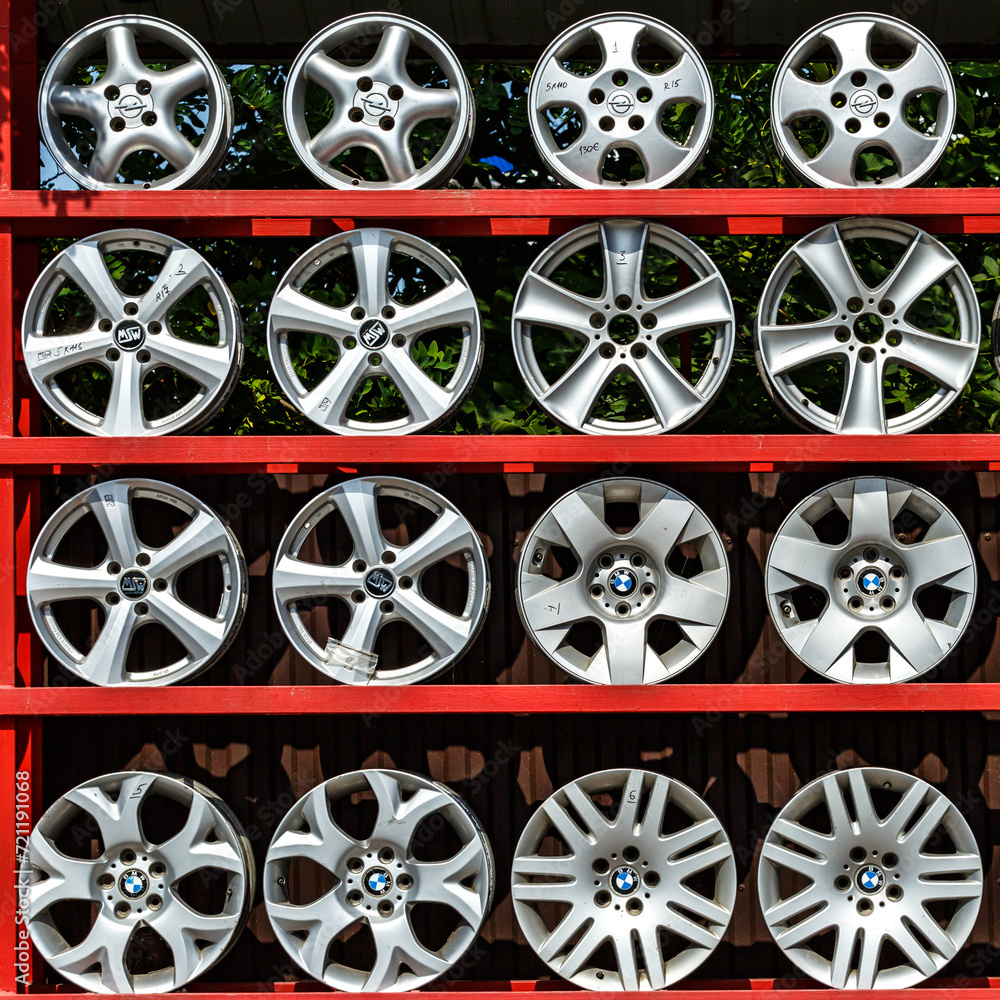 Kyiv, Ukraine. July18, 2021. Audi,BMW,Volkswagen,Opel car rims hang on ...