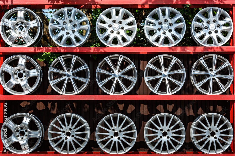 Kyiv, Ukraine. July18, 2021. Audi,BMW,Volkswagen,Opel car rims hang on ...