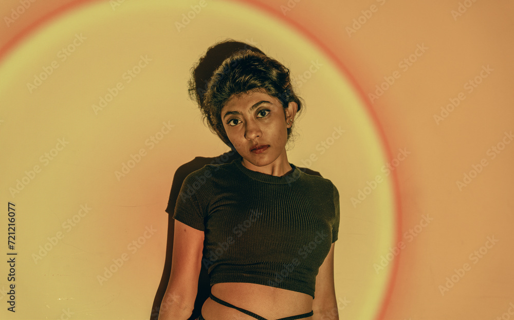 multiple different poses of a young model in the colorful background in ...
