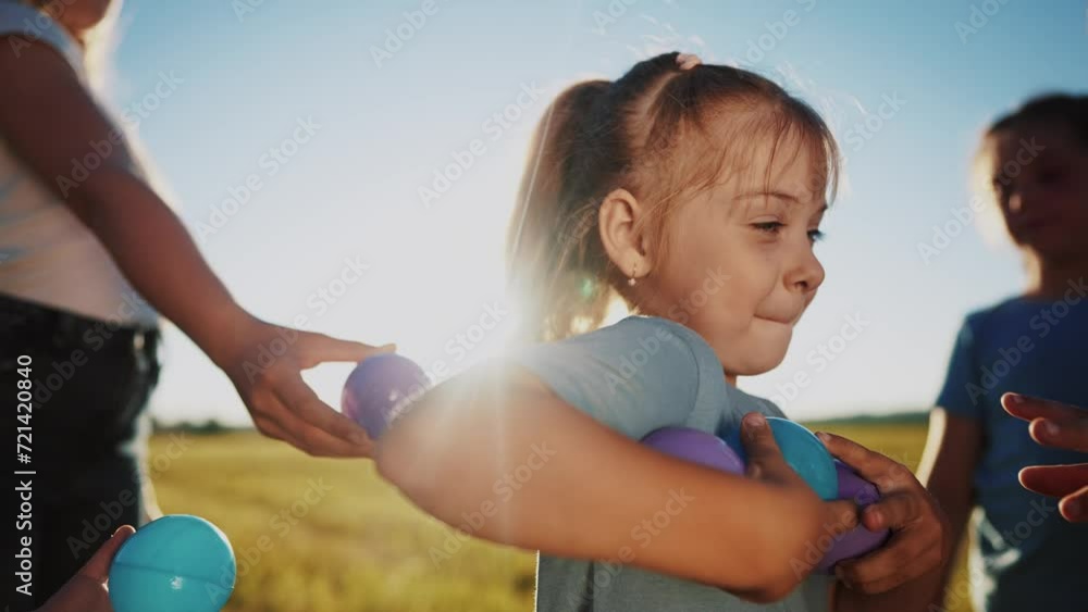 Vidéo Stock children conduct a relay race in nature in the park. happy ...