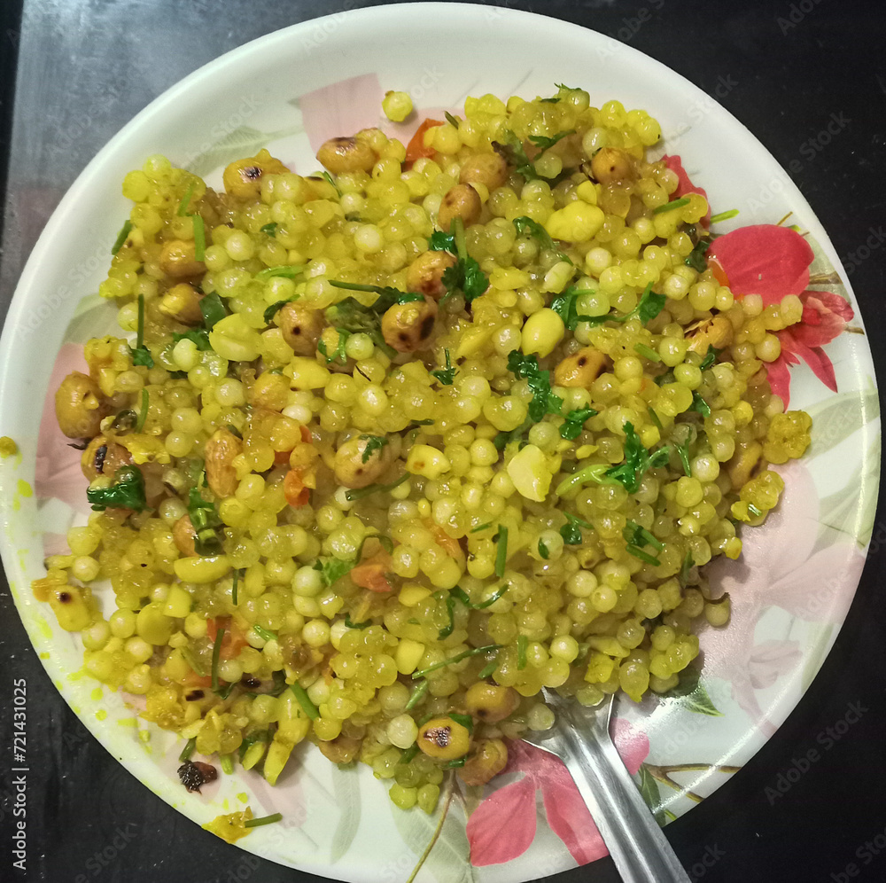Flatten rice also known as poha is popular Indian snack, seasoned with ...