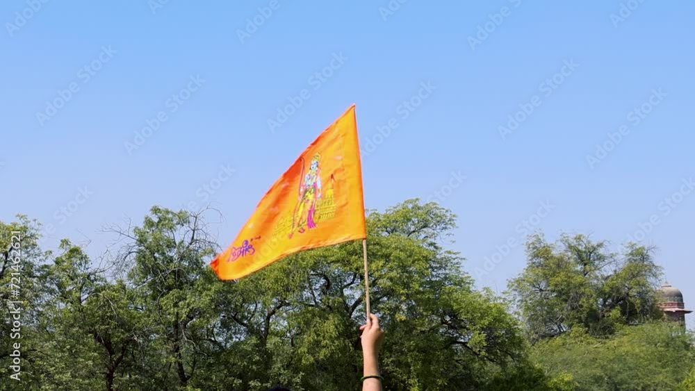 Vidéo Stock holy saffron flag with lord rama idol holing in hand with ...