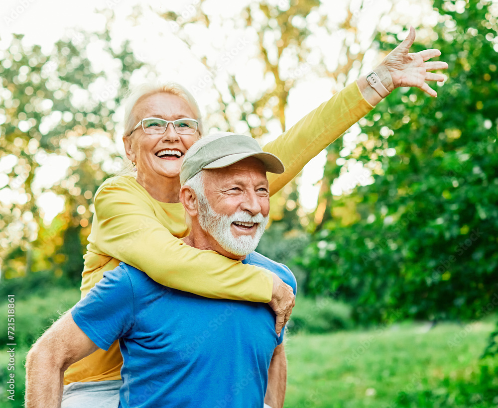 outdoor senior fitness woman man love active fun piggyback exercise ...