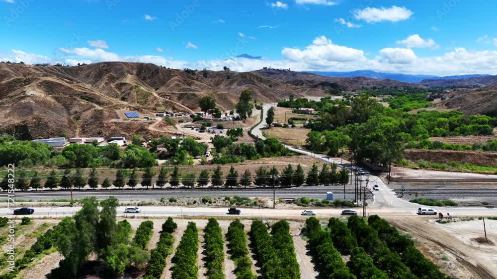 San Timoteo Canyon at the Train Rail Crossing with cars using the road ...