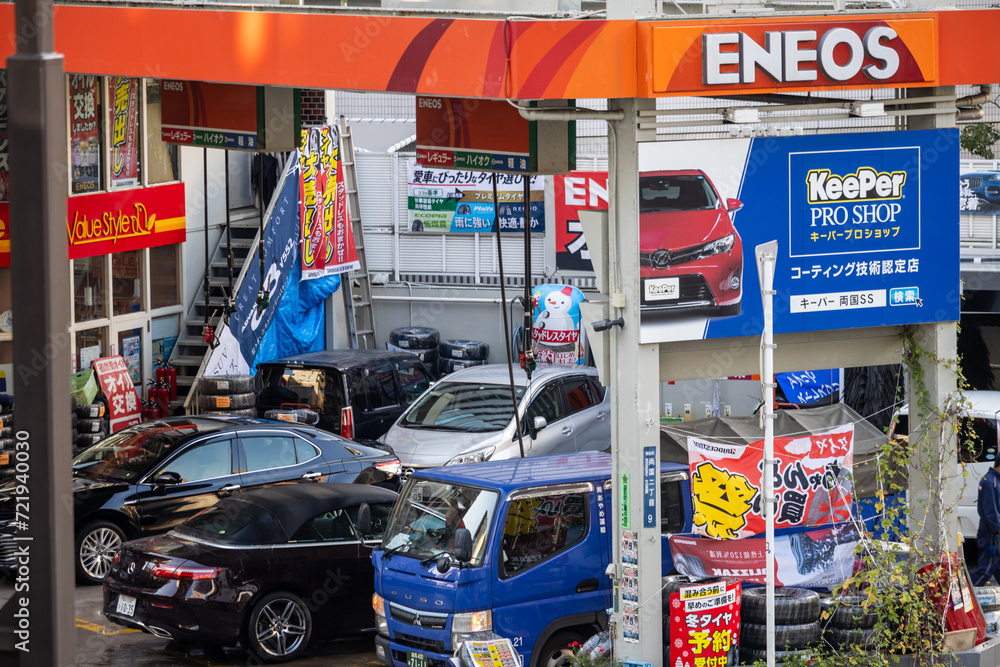 Tokyo, Japan, 1 November 2023: Busy gas station in Tokyo with colorful ...
