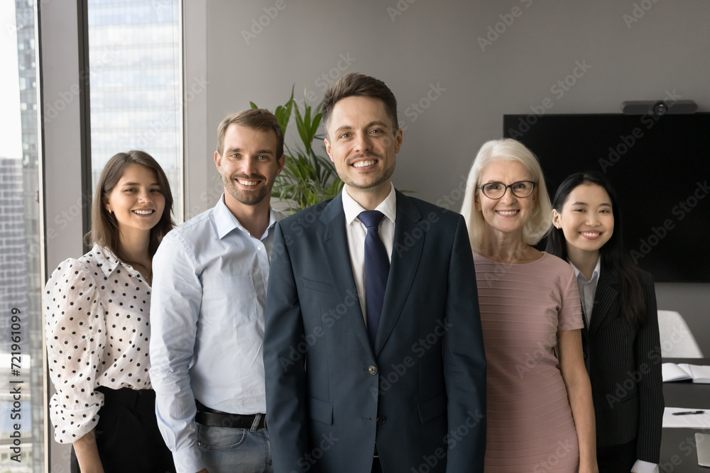 Happy attractive professional colleagues of different ages and races ...