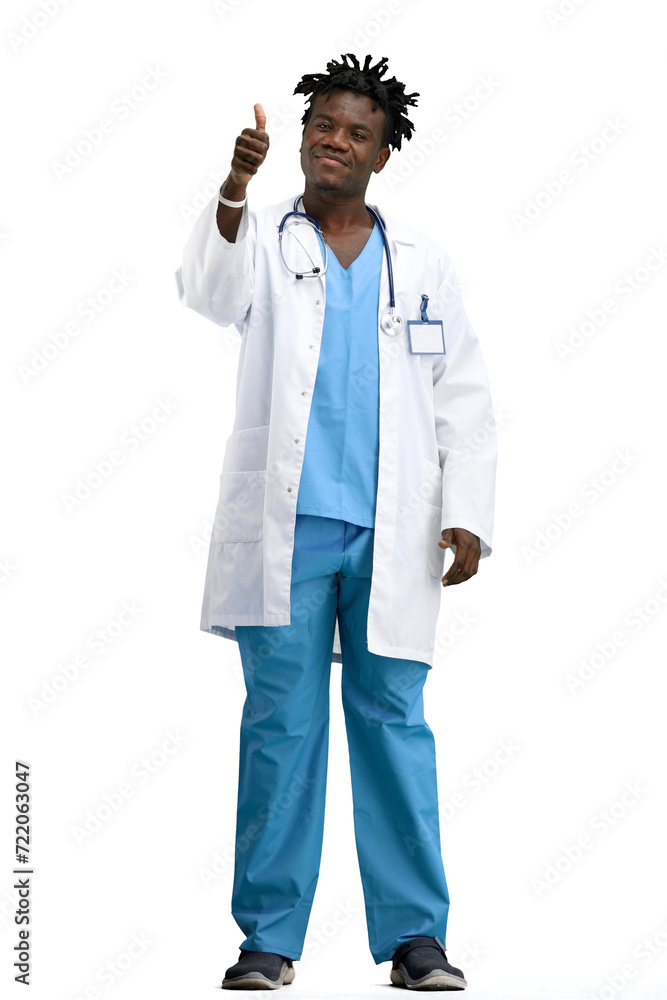 The doctor, in full height, on a white background, shows a thumbs up ...
