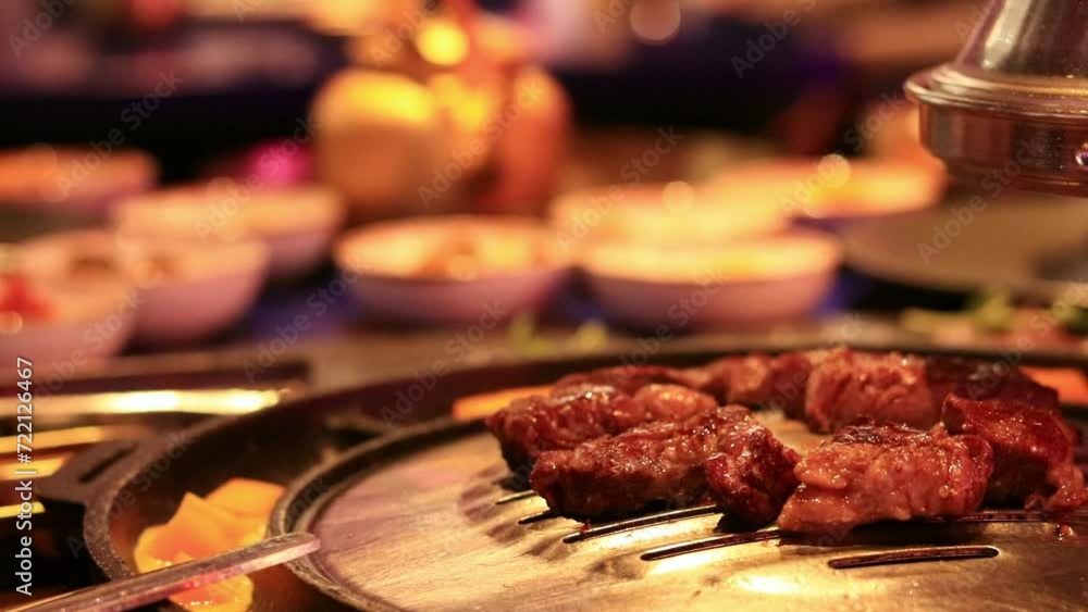 Korean Korean barbecue. Barbecue in a restaurant, roasting meat at the ...