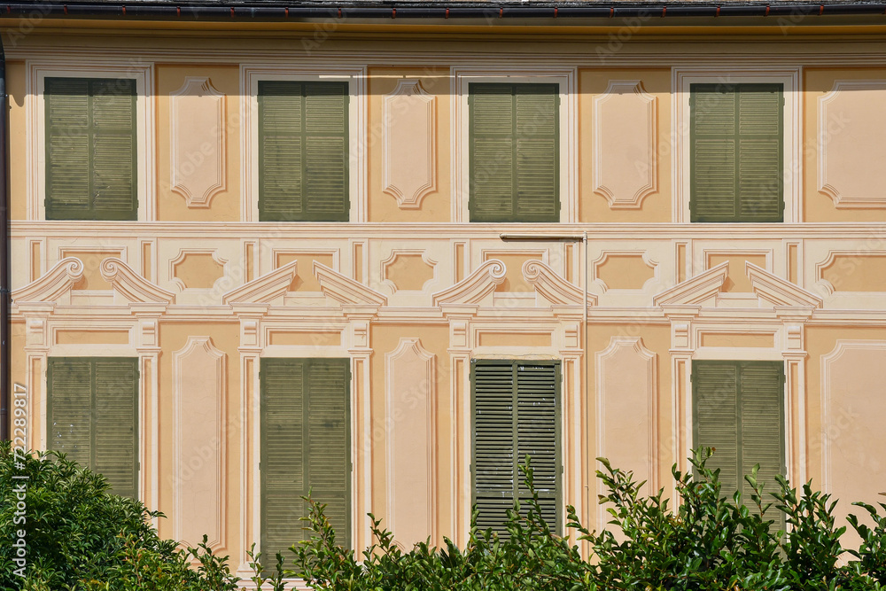 Facade with a double row of fake windows, painted with the trompe l ...