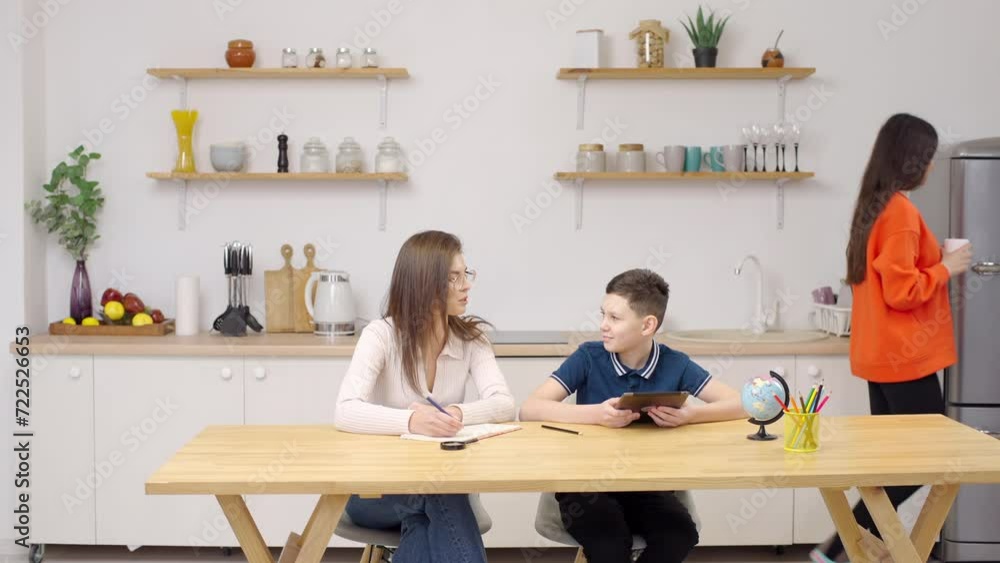 Homework, mother and son with education, tablet and conversation. Woman ...