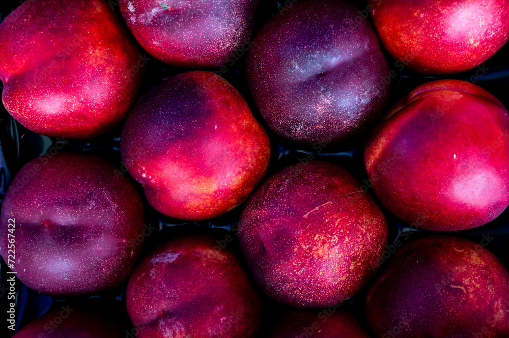 Background of bright and ripe nectarines in full screen. Summer ...