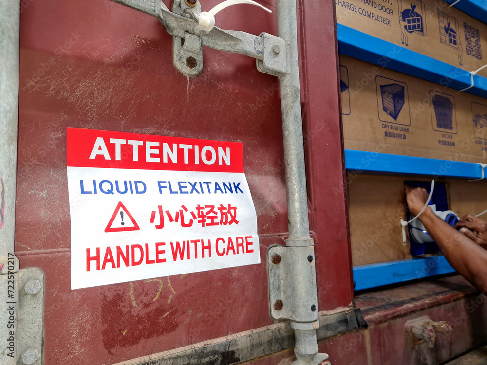 The label is prohibited from opening the container door before the ...