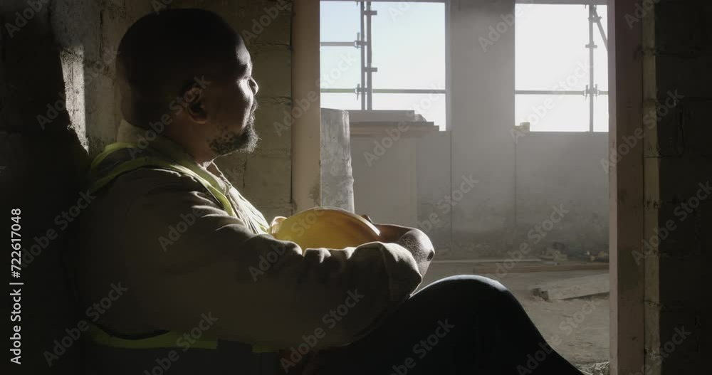 Thinking, construction site or black man on break to relax architecture ...