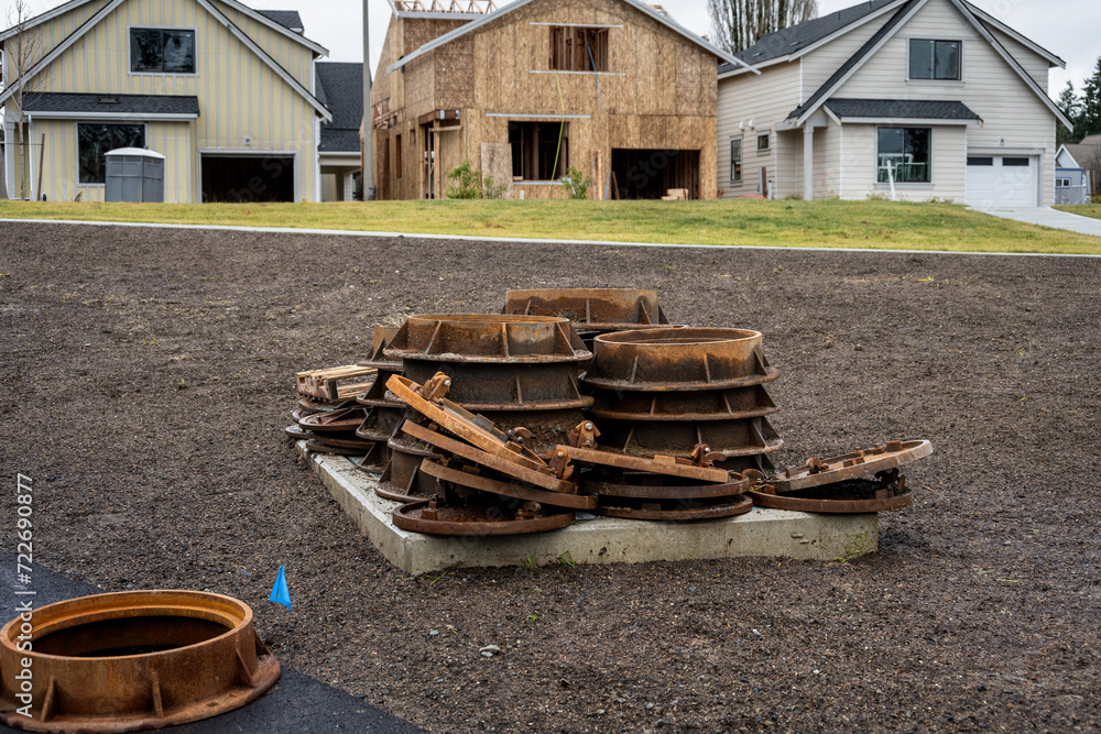 New residential community under construction, pile of sewer drain ...