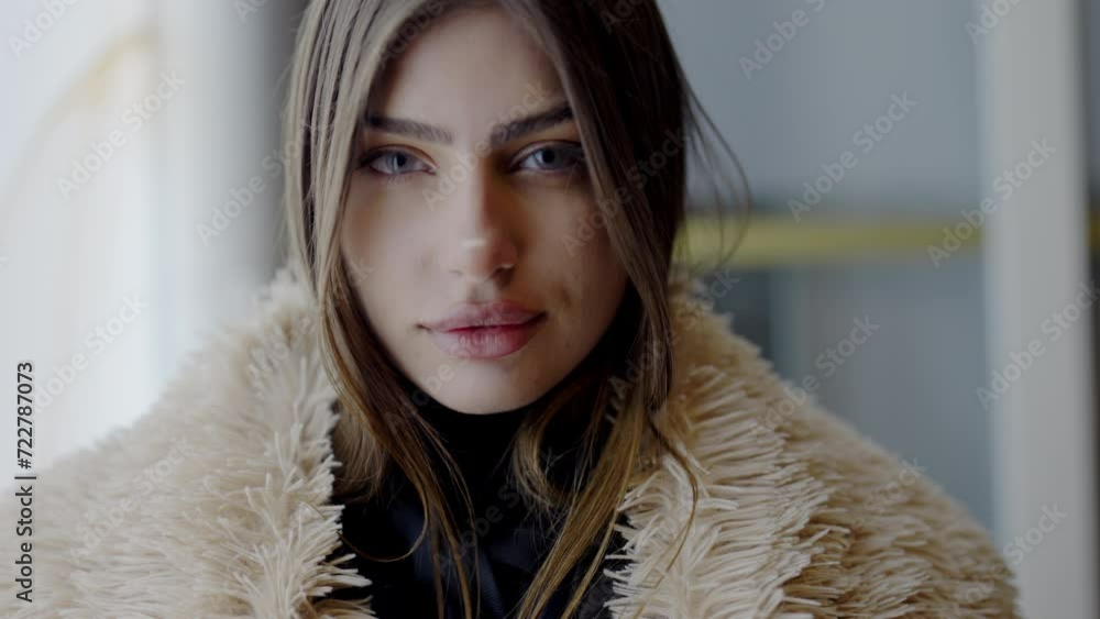 Young beautiful woman confidence look in studio during photo session ...