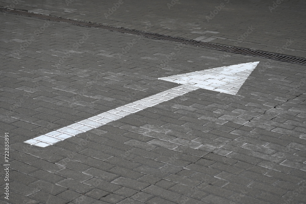 white arrow on gray asphalt, turn left, turn right, abstract white ...