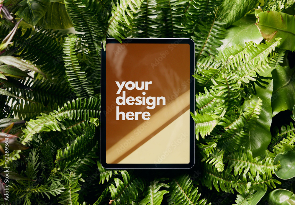 Mockup of digital tablet with customizable screen in foliage Stock ...
