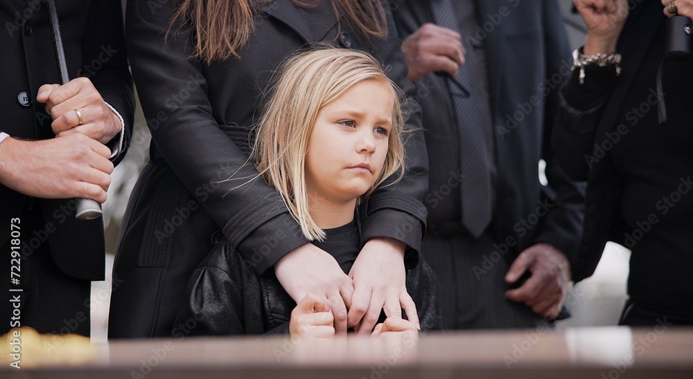 Child, sad and family at funeral at graveyard ceremony outdoor at ...