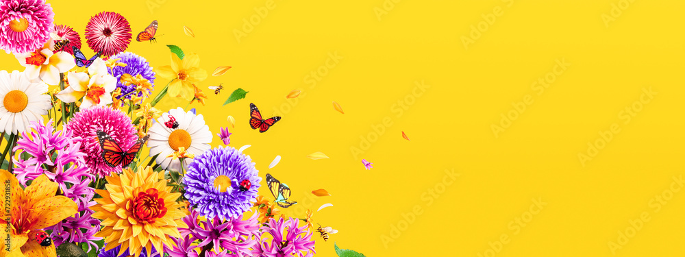 Beautiful colorful spring flowers with butterflies on vibrant yellow ...