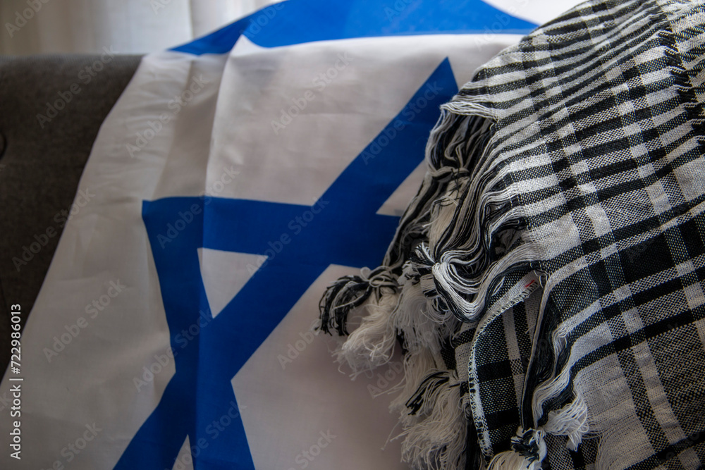 Israel flag and Palestinian scarf together lying on a rope to dry after ...