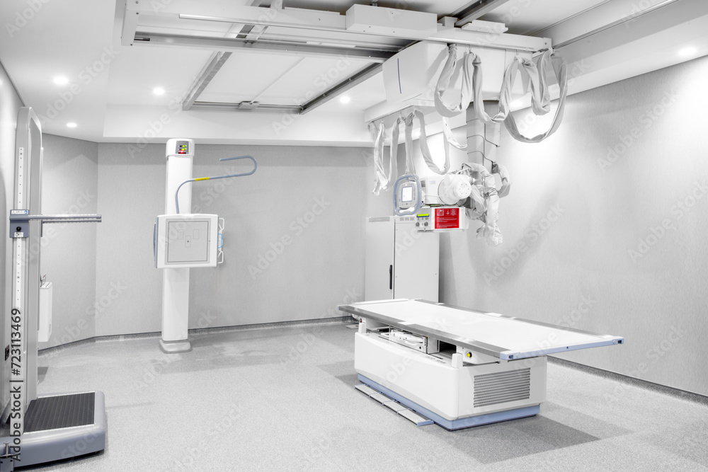 X-ray department in modern hospital. Radiology room with scan machine ...
