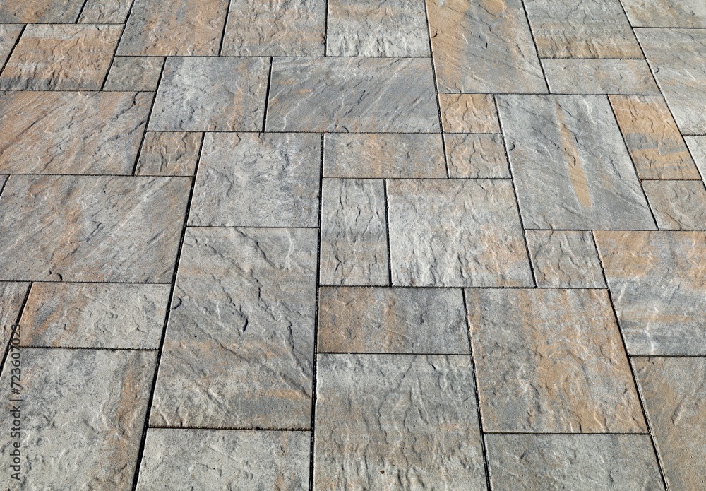 Gray and brown stone paver tiles of different shapes for outdoor ...