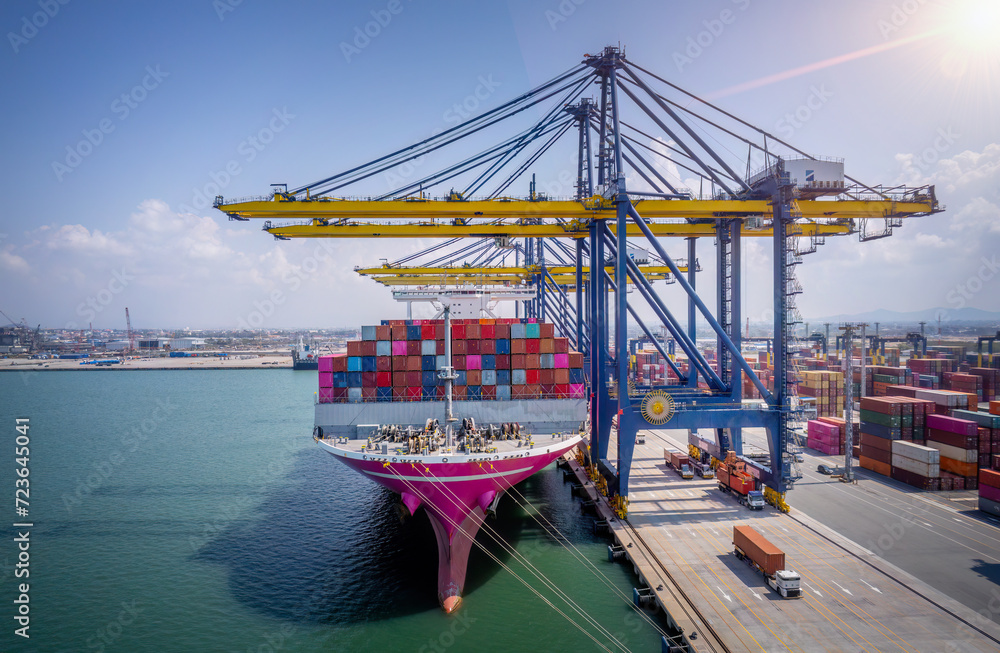cargo ship and truck at seaport waiting for container dock crane ...