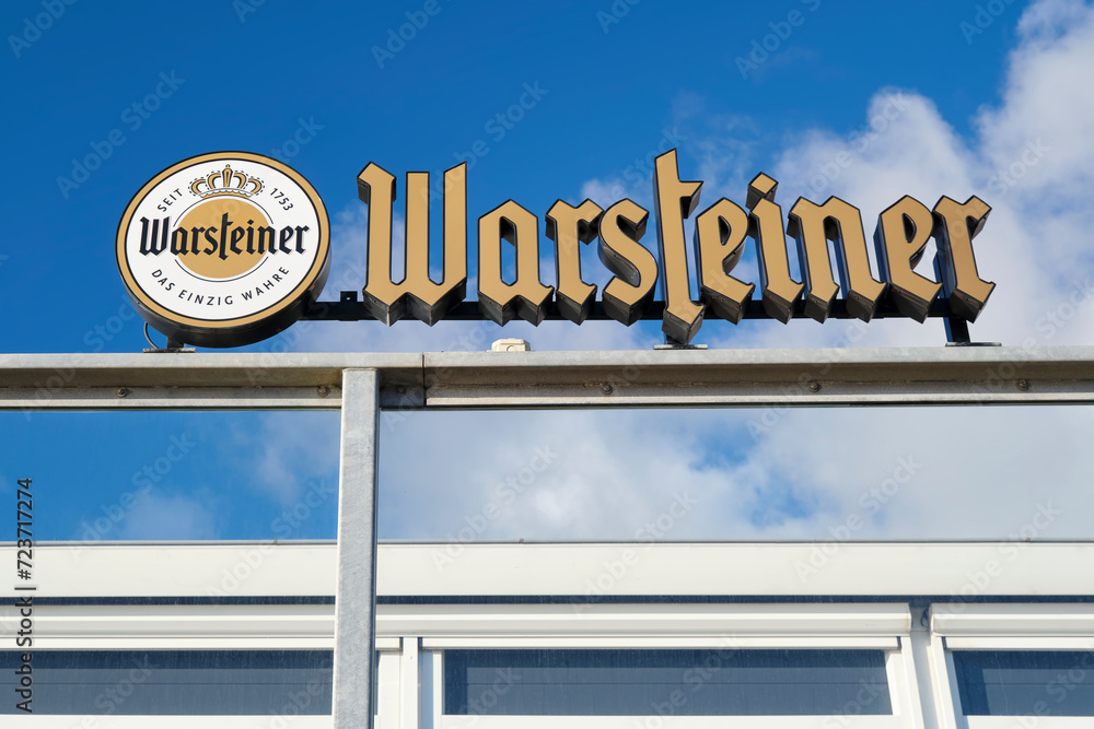 Warsteiner premium beer sign logo and brand text on restaurant terrace ...