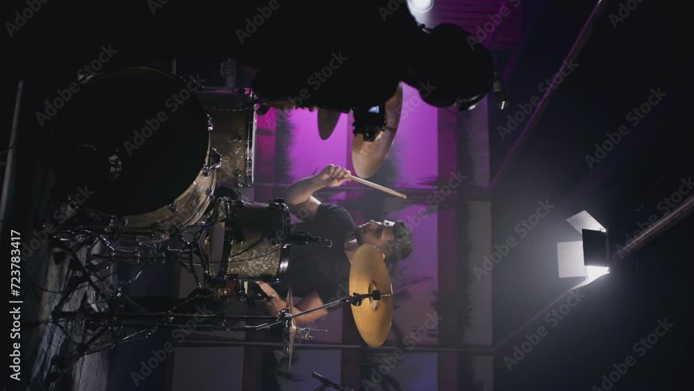 Vertical: Shooting a music video. The director of photography makes a ...