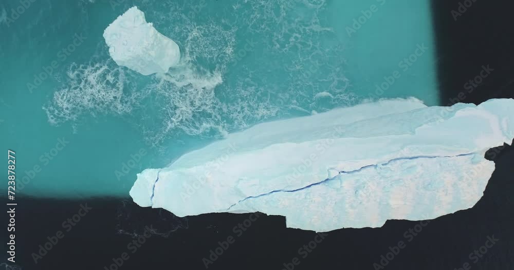Huge crashed iceberg melting in Antarctica ocean. Glaciers floating in ...