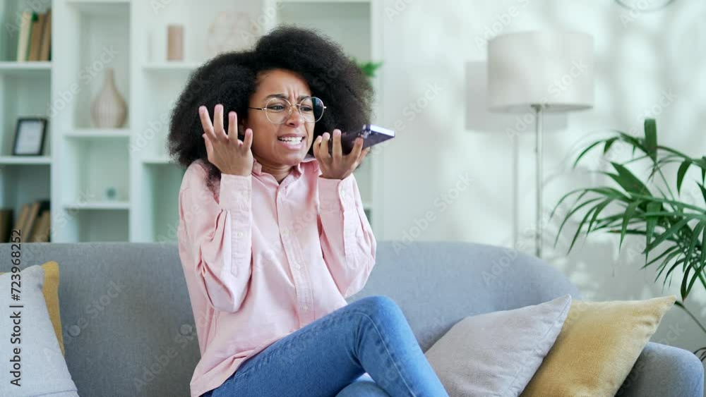 Angry young african american female talking arguing on the mobile phone ...