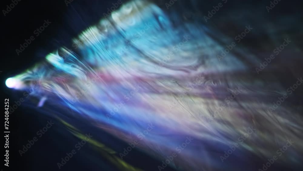 Film projector with flashing lights in colorful smoke. Searchlight ...