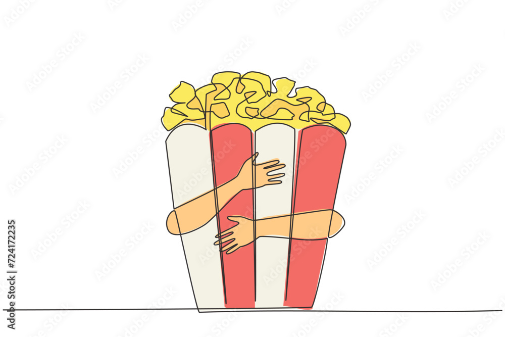 Continuous one line drawing of hand hugging popcorn. Movie time ...