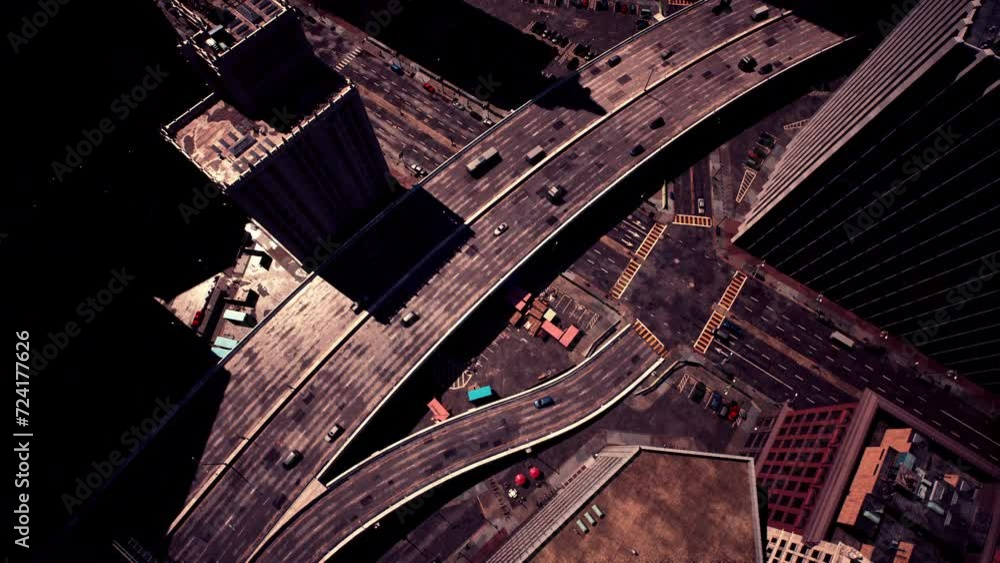 An aerial city road intersection, capturing the bustling movement and ...