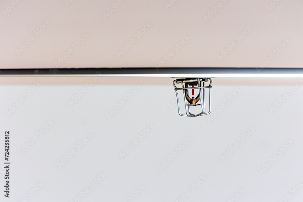 Fire sprinkler installed on the ceiling. Fire protection installations ...